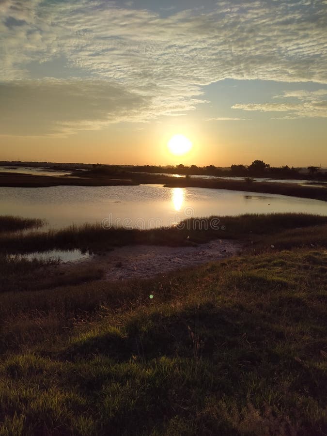 Evening by the Lake Watching the Sunset Stock Image - Image of sunset ...