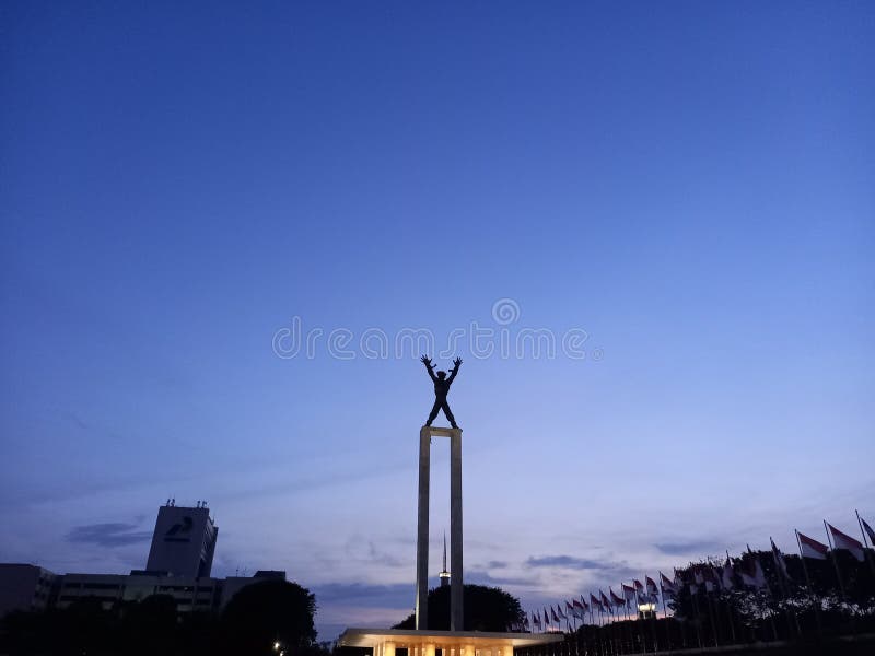 An Evening in Lapangan Banteng Stock Image - Image of reflection, tower ...