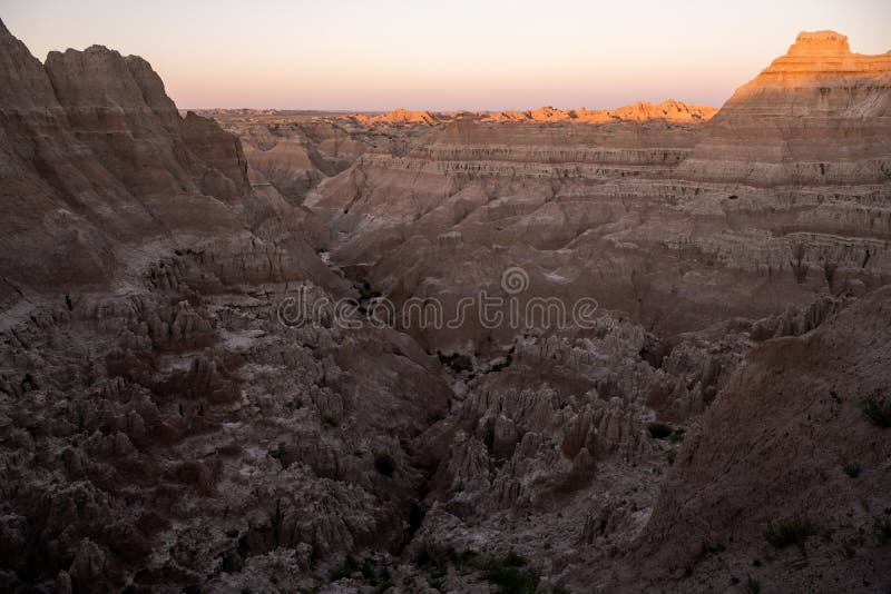 Evening Light Falls Over Badlands Valley Stock Image - Image of clouds ...