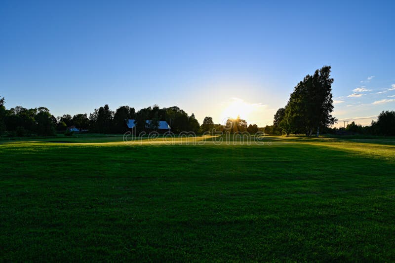 Evening Light Over Golf Course in Kumla Sweden Stock Photo - Image of ...
