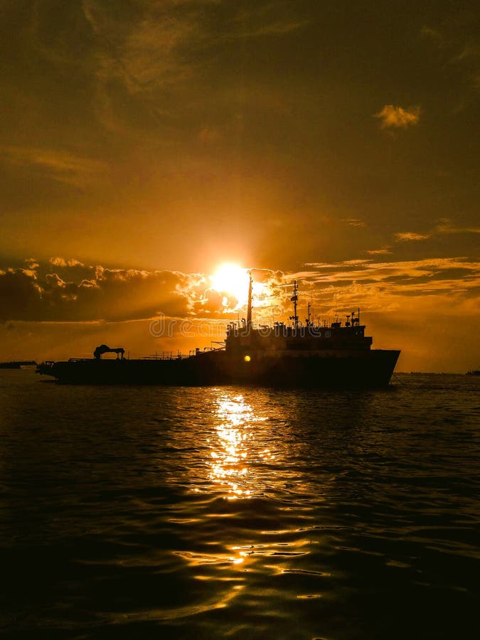 The Evening Light Splits the Sea and the Ships that are Sailing Stock ...