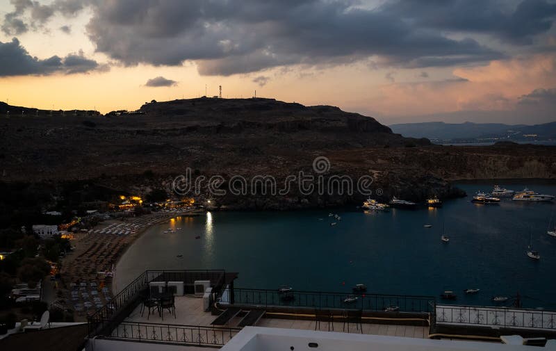 Evening Lindos beach stock photo. Image of dodecanese - 300931160
