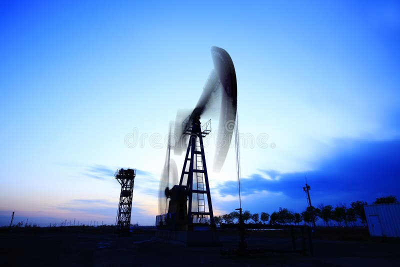 The oil pump is running. stock photo. Image of pumpjack - 118459988