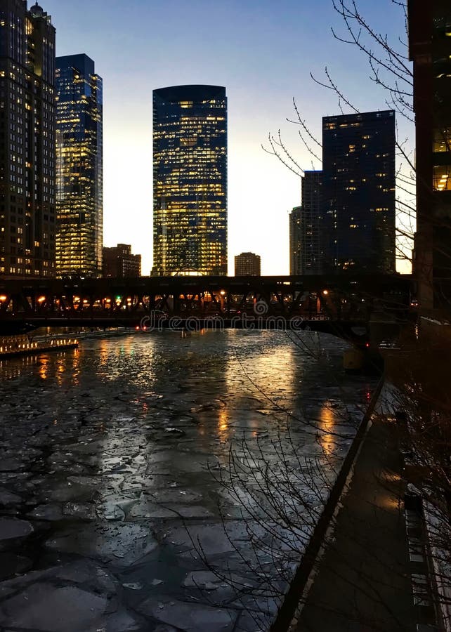 Evening Over a Frozen Chicago River in the Loop during Evening Commute ...