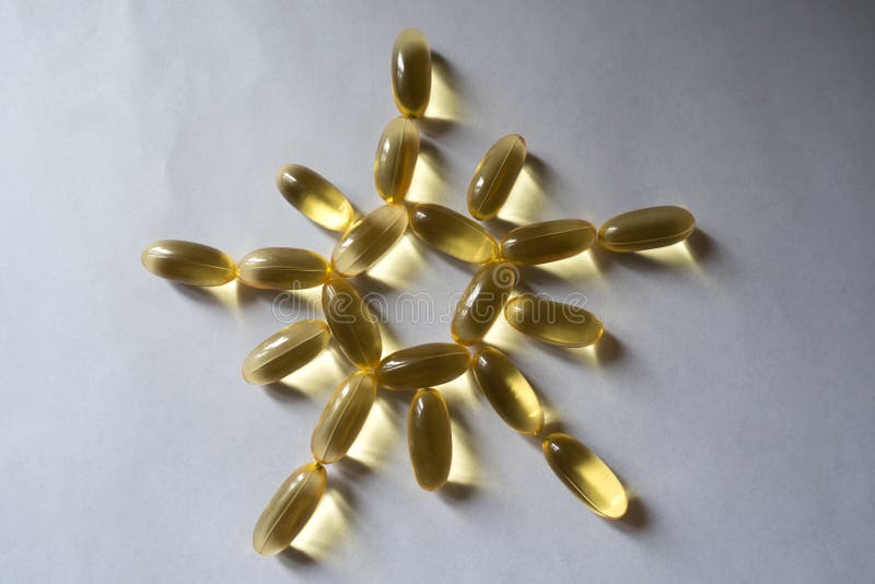 Evening Primrose Oil Supplement Capsules in a Star Shape Stock Image ...