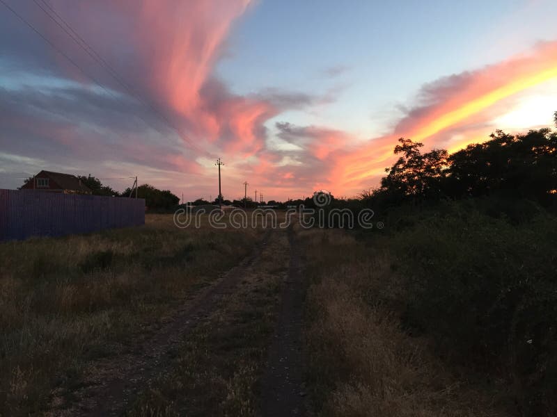 Sunset and Dirt Road stock image. Image of valley, evening - 122469865