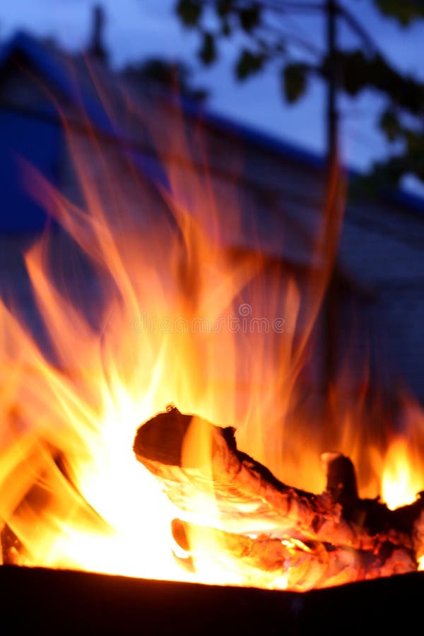Evening rest near a fire stock photo. Image of bonfire - 74536332