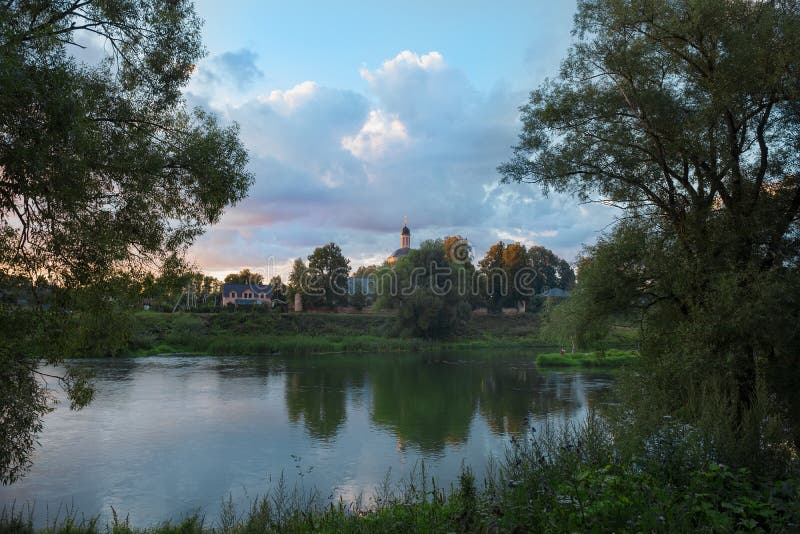 In the Evening on the River Bank Stock Image - Image of orange, color ...