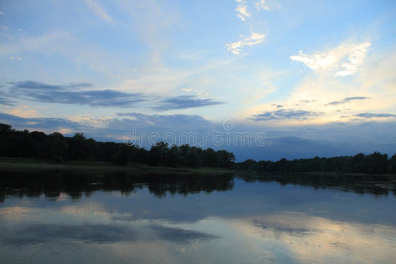 Evening on the river stock image. Image of river, black - 65151707