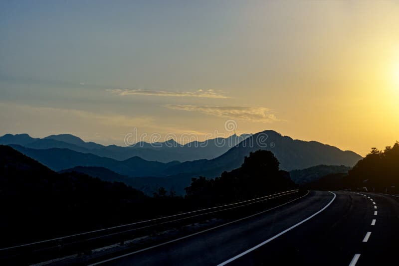 Evening Road in the Mountains Stock Photo - Image of landscape, journey ...