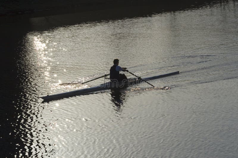 Evening sculler stock image. Image of ripple, fitness - 2225207