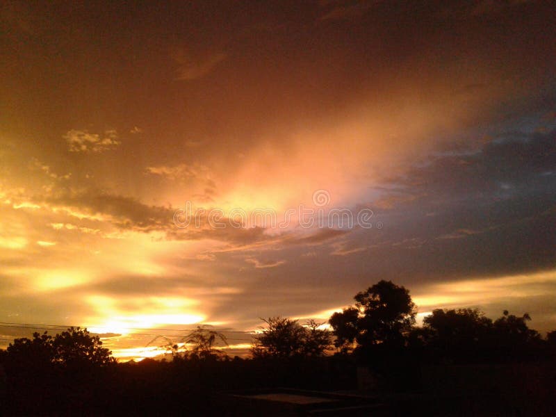 Evening sky stock photo. Image of sunset, horizon, setting - 203541412