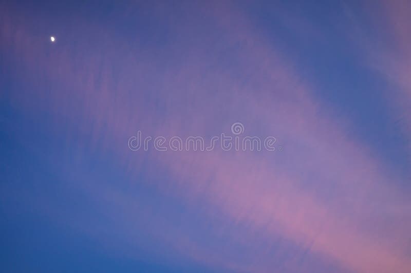 Evening Sky Changes with a Crescent Moon and Soft Colors Stock Image ...
