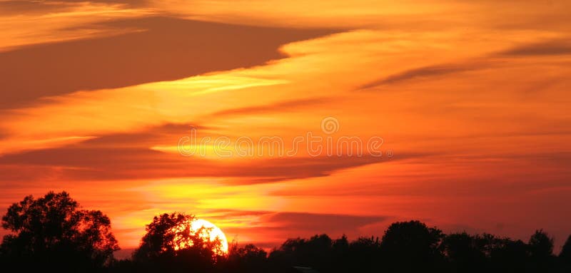 Evening Sky Illuminated by a Bright Red Sunset Stock Photo - Image of ...