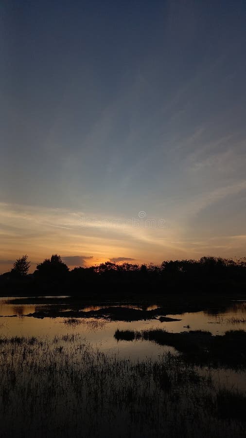 Evening Sky Silhouette Twilight Over Water Stock Photo - Image of ...