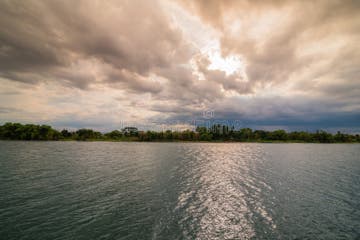 Evening Storm Over River and Dramatic Sky and Clouds Stock Image ...