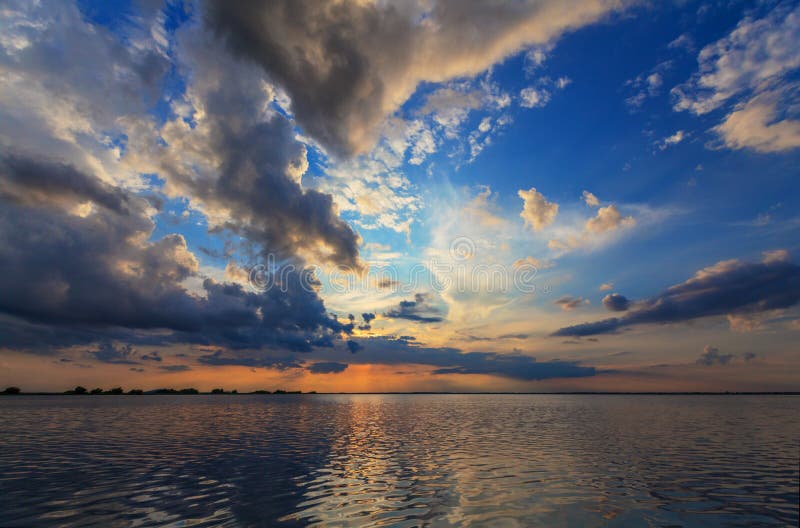 Evening Storm Over River and Dramatic Sky and Clouds Stock Image ...