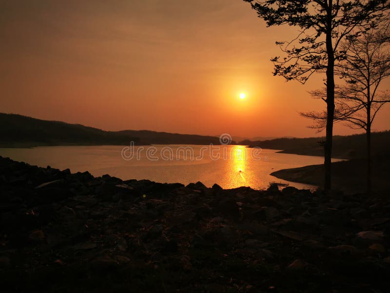 Evening sun in the dam stock photo. Image of cloud, twilight - 154558634