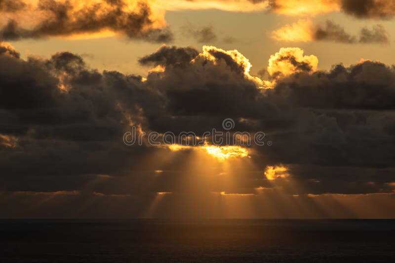 Evening Sun Hiding Behind Clouds Stock Photo - Image of dramatic ...
