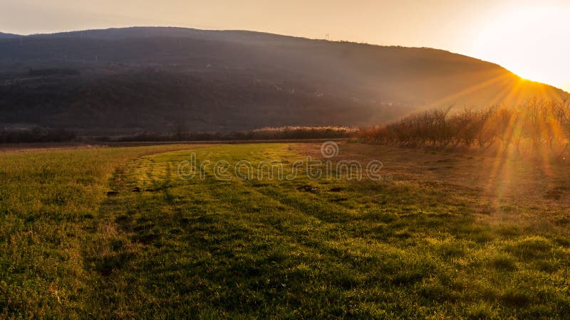 Evening Sun Rays on a Landscape Stock Photo - Image of evening, dusk ...