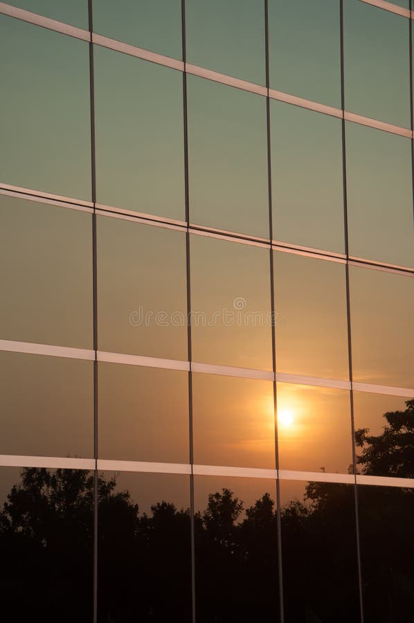 The Evening Sun Reflected the Glass of the Building Stock Image - Image ...