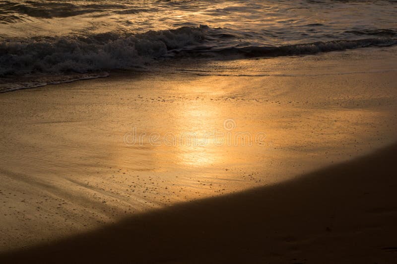 Sunrise Clouds Reflecting In The Wet Beach Sand Stock Photo - Image of ...