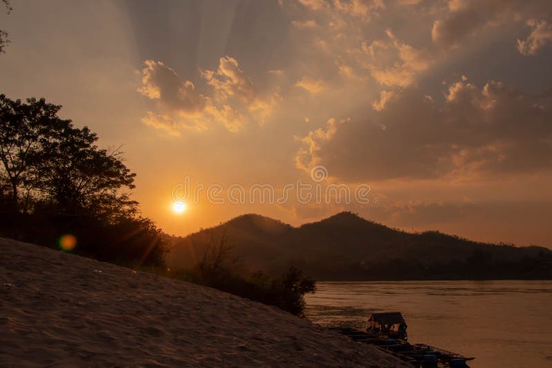 Evening Sunlight that Hit Clouds, Water Surface, Sand Stock Photo ...