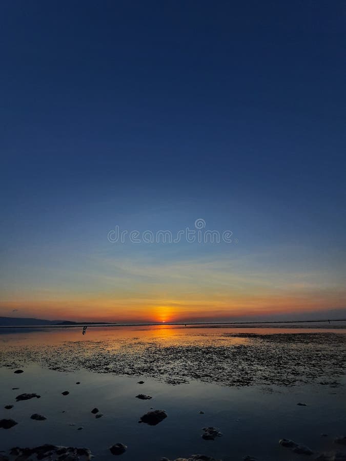 Evening sunset silhouette stock image. Image of reflection - 264759703