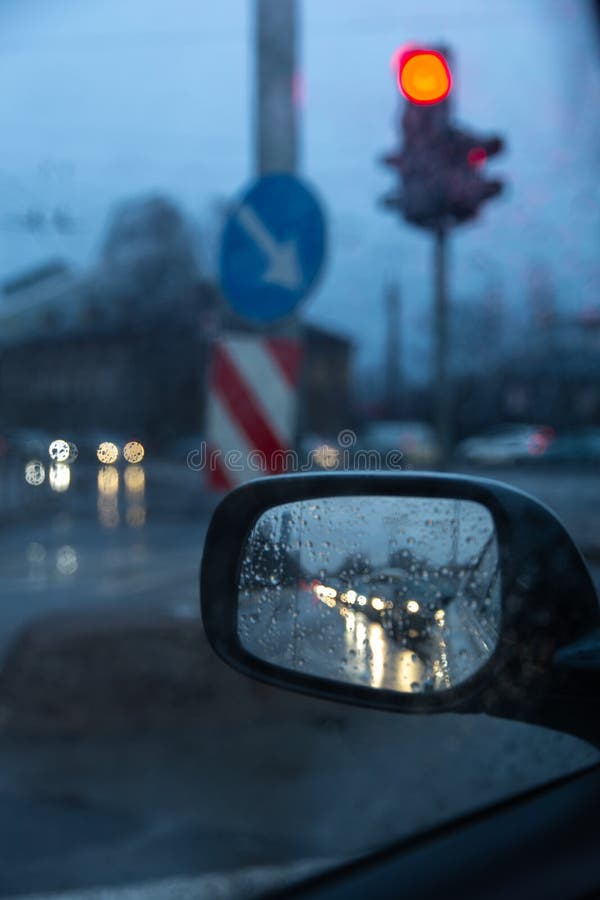 Evening Traffic Jam in Side Rear-view Mirror with Red Traffic Lights ...
