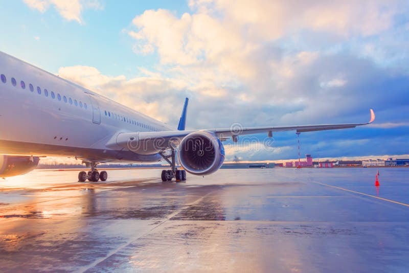 Evening View of a Passenger Plane Wing with Engine Stock Photo - Image ...