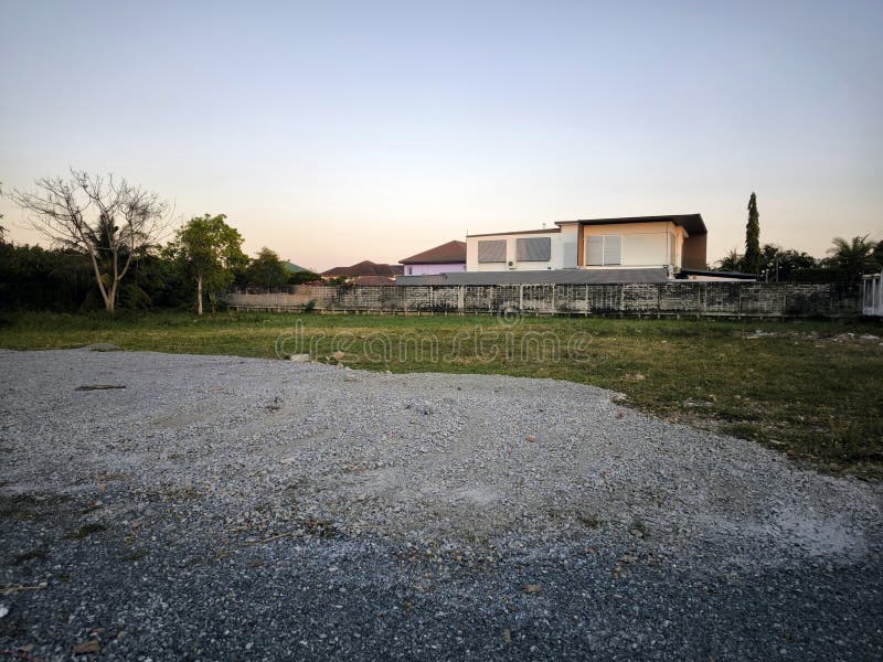 Evening View of Residential Area with Gravel Ground Stock Image - Image ...