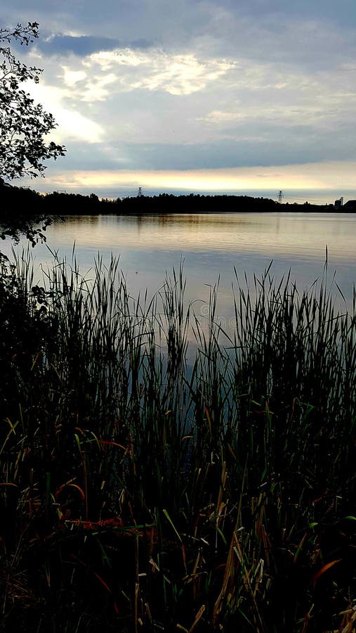 Evening stock image. Image of light, evening, water, reflection - 97010335