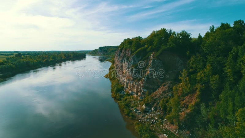 Evening in the Wild. the Dense Forest Grows on an Impregnable Rock ...