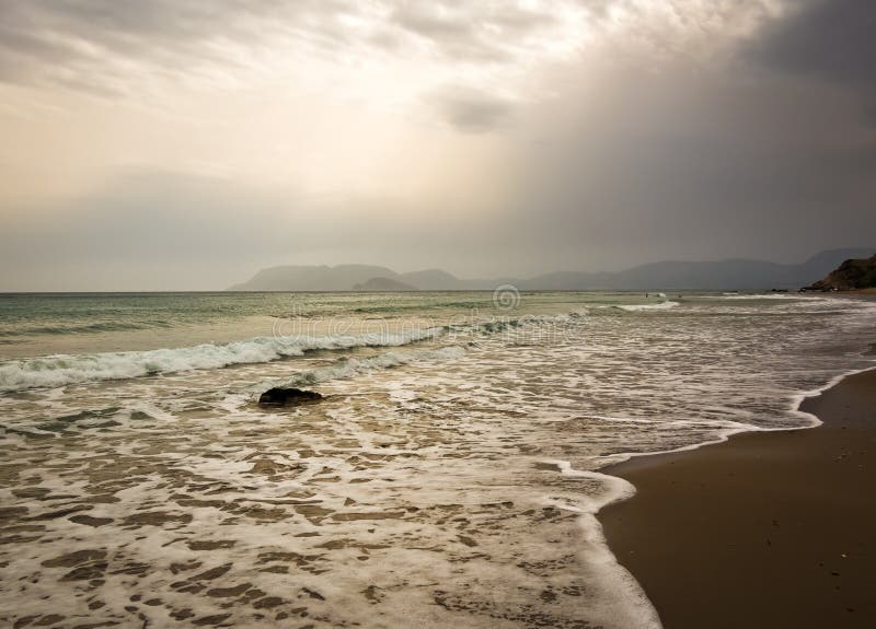 Evening at the windy beach stock image. Image of rays - 43084057