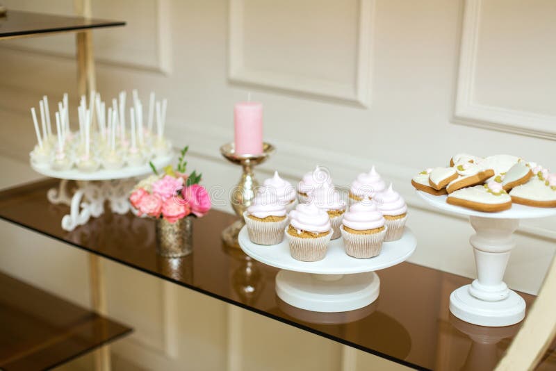 Event Table with Sweets, Minimal Decorated with Fresh Flowers Stock ...