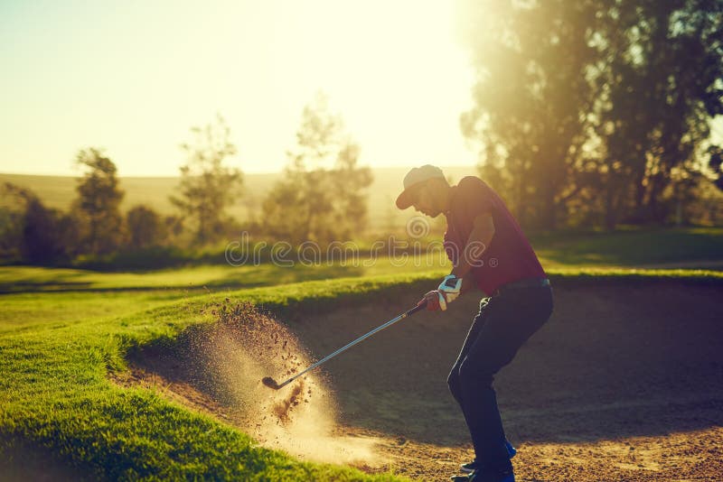 Every Game Comes with Its Challenges. a Young Man Hitting the Ball Out ...