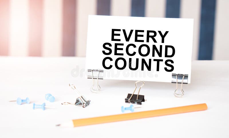 EVERY SECOND COUNTS Sign on Paper on White Desk with Office Tools. Blue ...