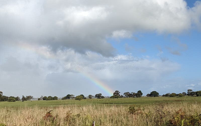 After Every Storm There Comes a Rainbow Stock Photo - Image of storm ...