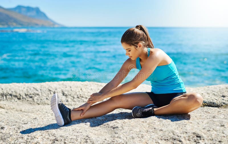 Every Workout Routine Needs Stretching. a Young Woman Stretching before ...