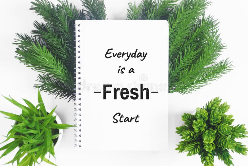 Everyday is a Fresh Start. Notebook on Green Leaves. Stock Photo ...