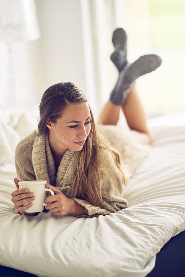 Everyday is a Fresh Start. a Young Woman Drinking a Warm Beverage at ...