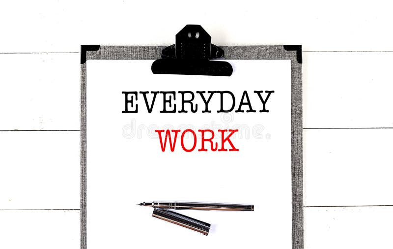 EVERYDAY WORK Text on Clipboard on White Background Stock Photo - Image ...