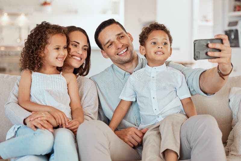 Everyone is Camera Ready. a Young Family Taking a Selfie at Home. Stock ...