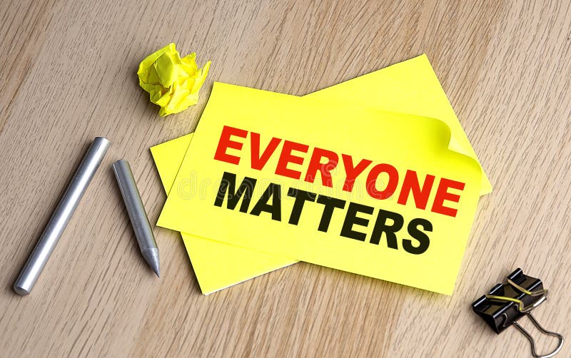 EVERYONE MATTERS Written on a Sticky on Notebooks Stock Image - Image ...