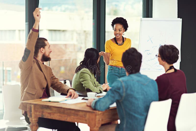 Everyones Input is Important. a Young Creative Giving a Presentation To ...