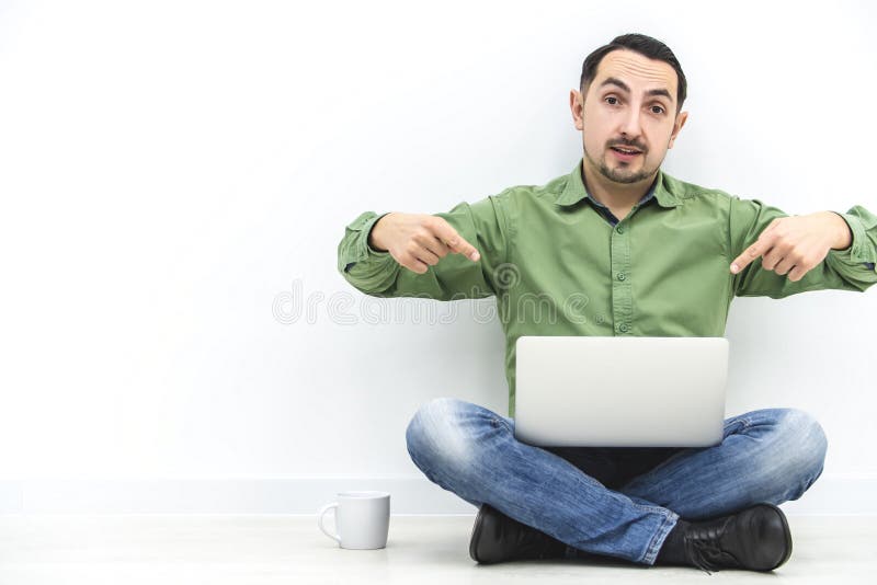 Everything is Great. Positive Joyful Man Pointing at Laptop S Screen ...