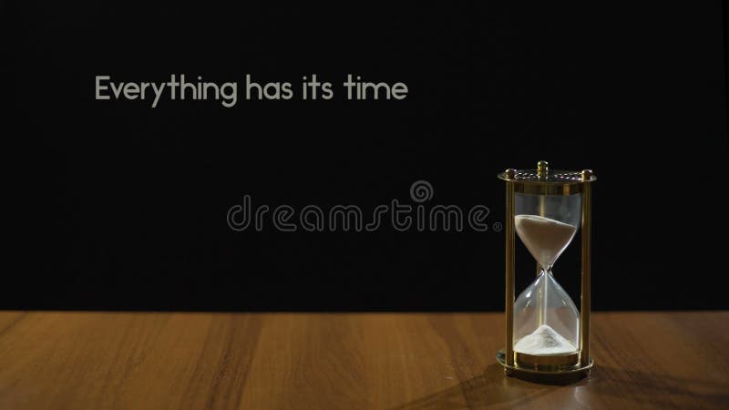 Everything Has Its Time, Wise Phrase about Patience, Sand Flowing in ...