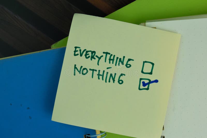 Everything and Nothing Write on Sticky Notes and Supported by ...