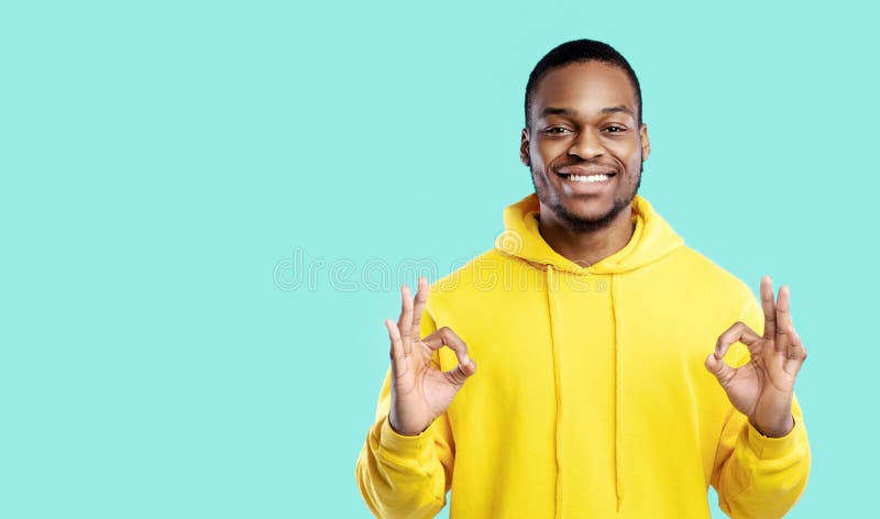 African Guy Gesturing Okay Sign with Both Hands, Blue Background Stock ...