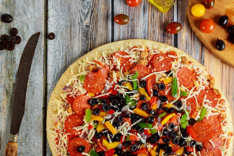 Pizza with Everything stock image. Image of canadian, olives - 1143951